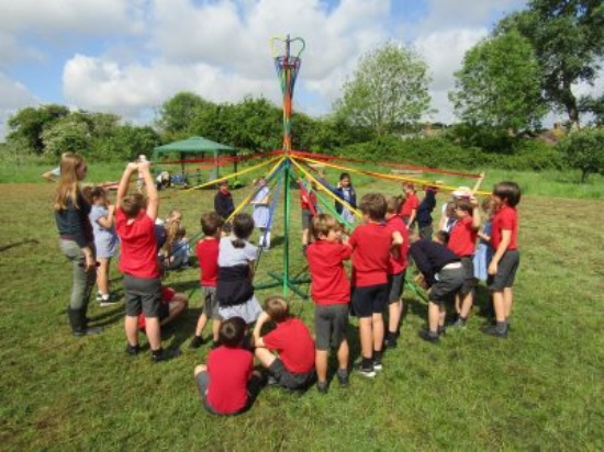 St Philip's Catholic Primary School - Maypole dancing